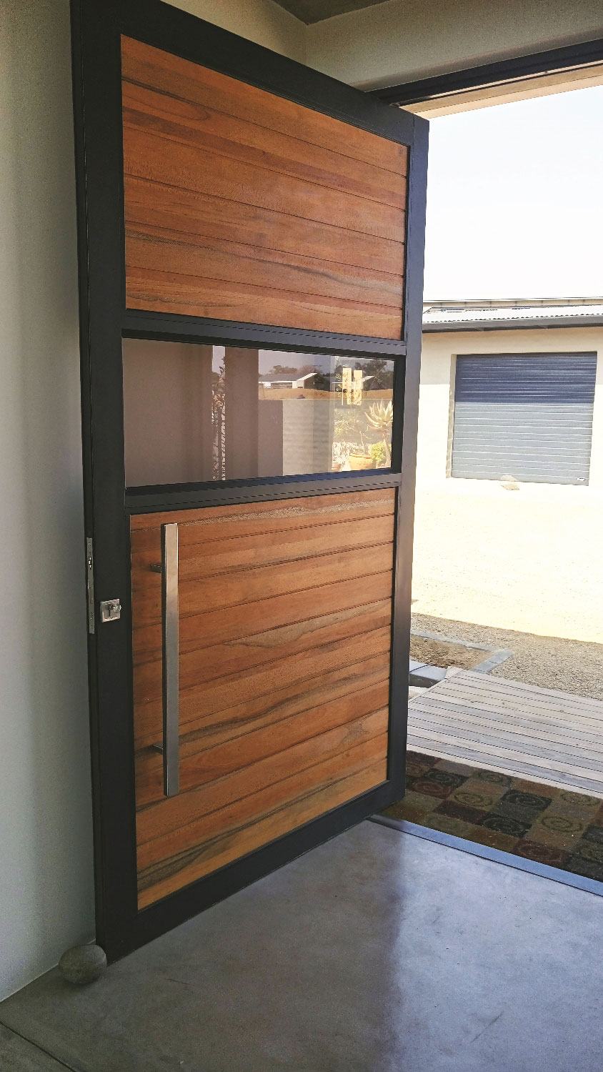 YOSO entrance door by Van Acht Wooden Windows and Doors